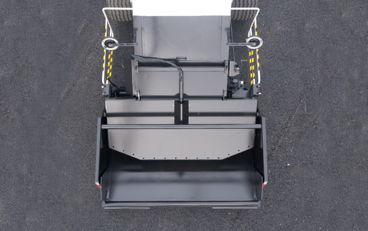 The Shuttle Buggy 1500 material transfer vehicle (MTV) combines the ...